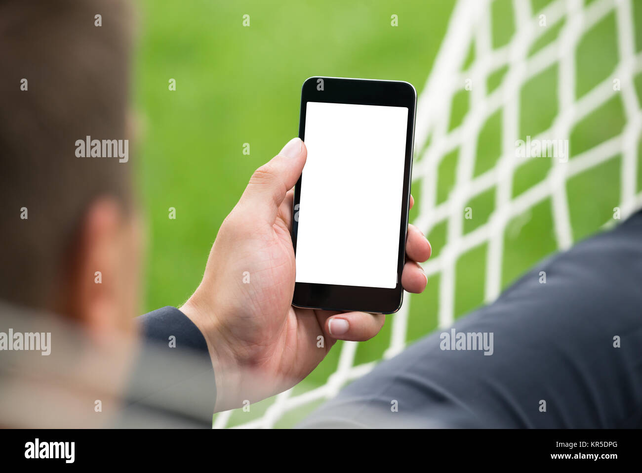 Person's Hand Holding Mobile Phone With Blank Screen Stock Photo - Alamy