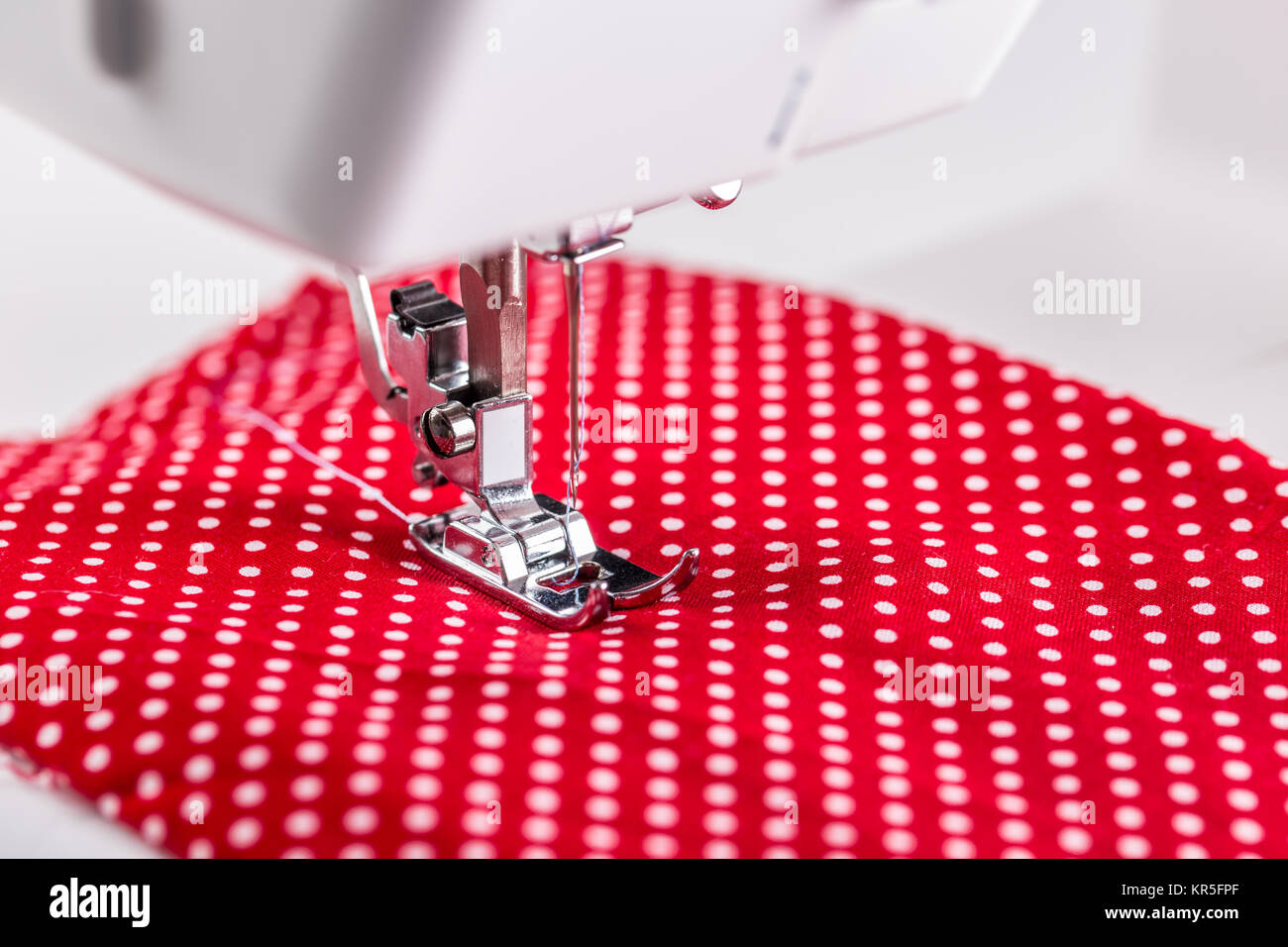 Sewing machine working part Stock Photo - Alamy