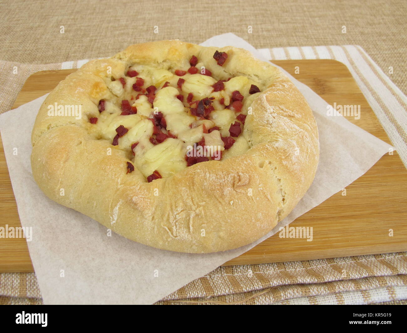 pizza bread streetfood with cheese and ham Stock Photo - Alamy