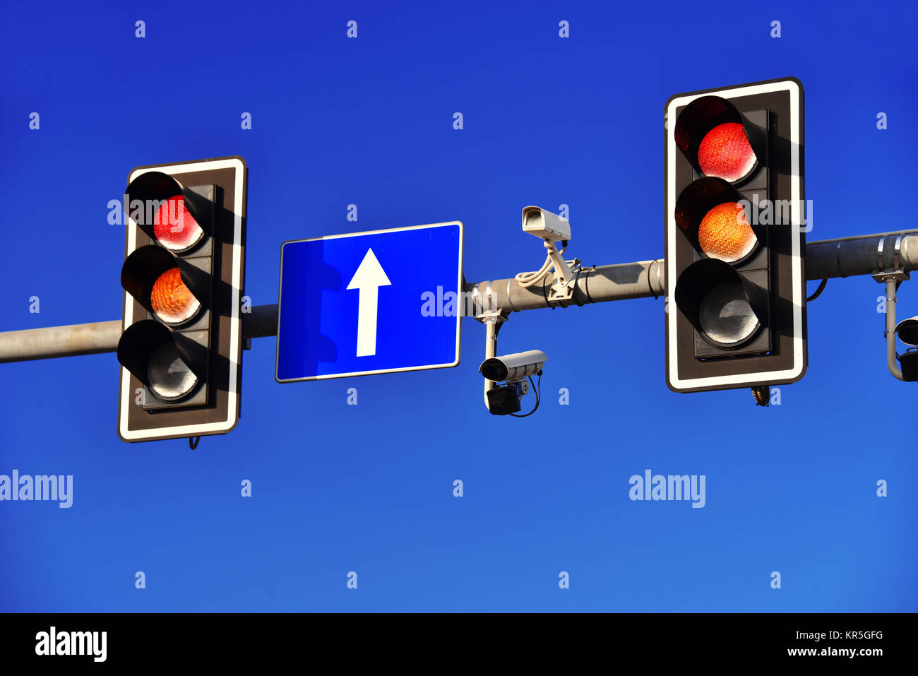 Traffic lights over blue sky Stock Photo - Alamy