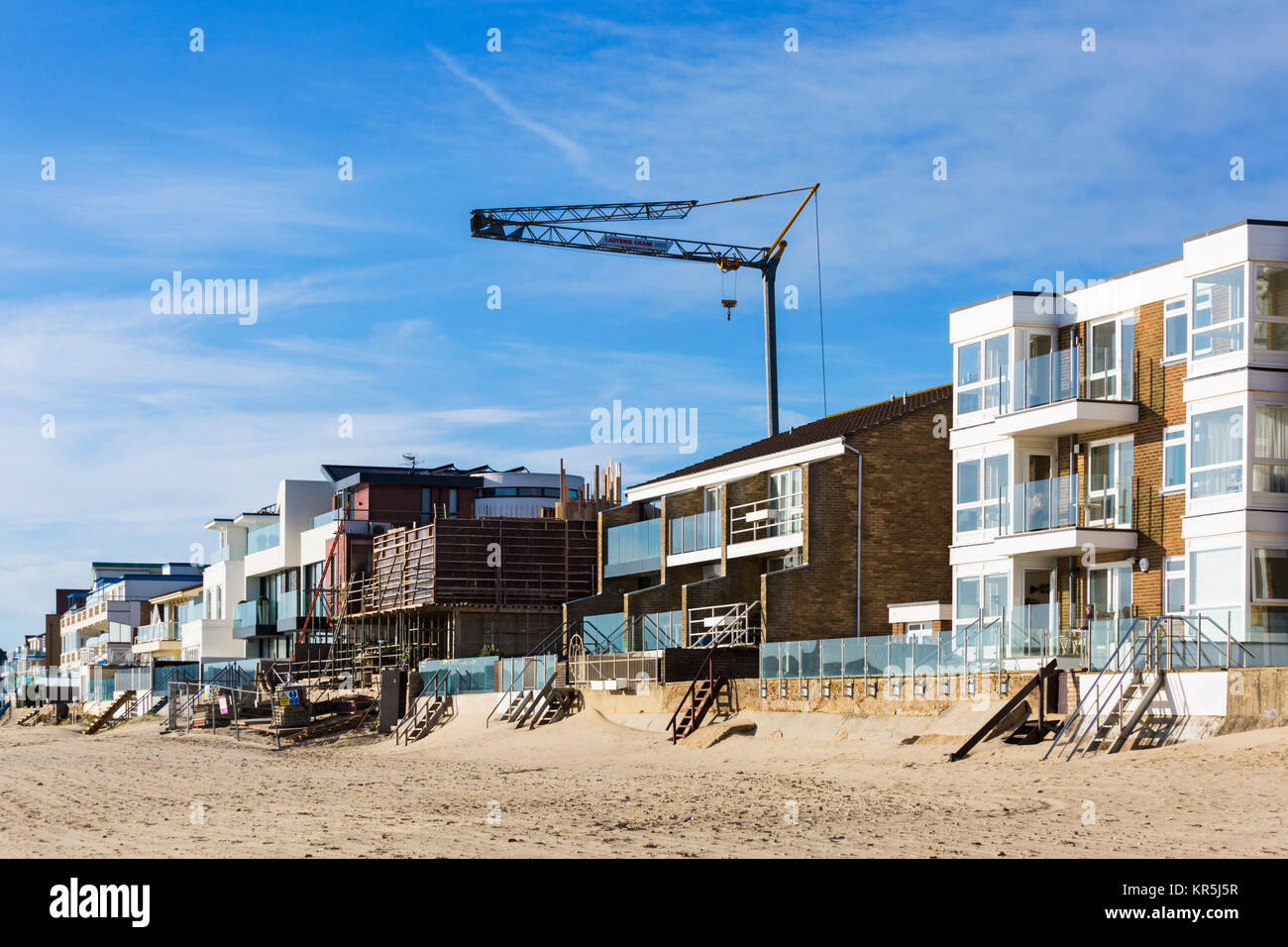 Redevelopment construction with luxury seaside properties at the beach ...