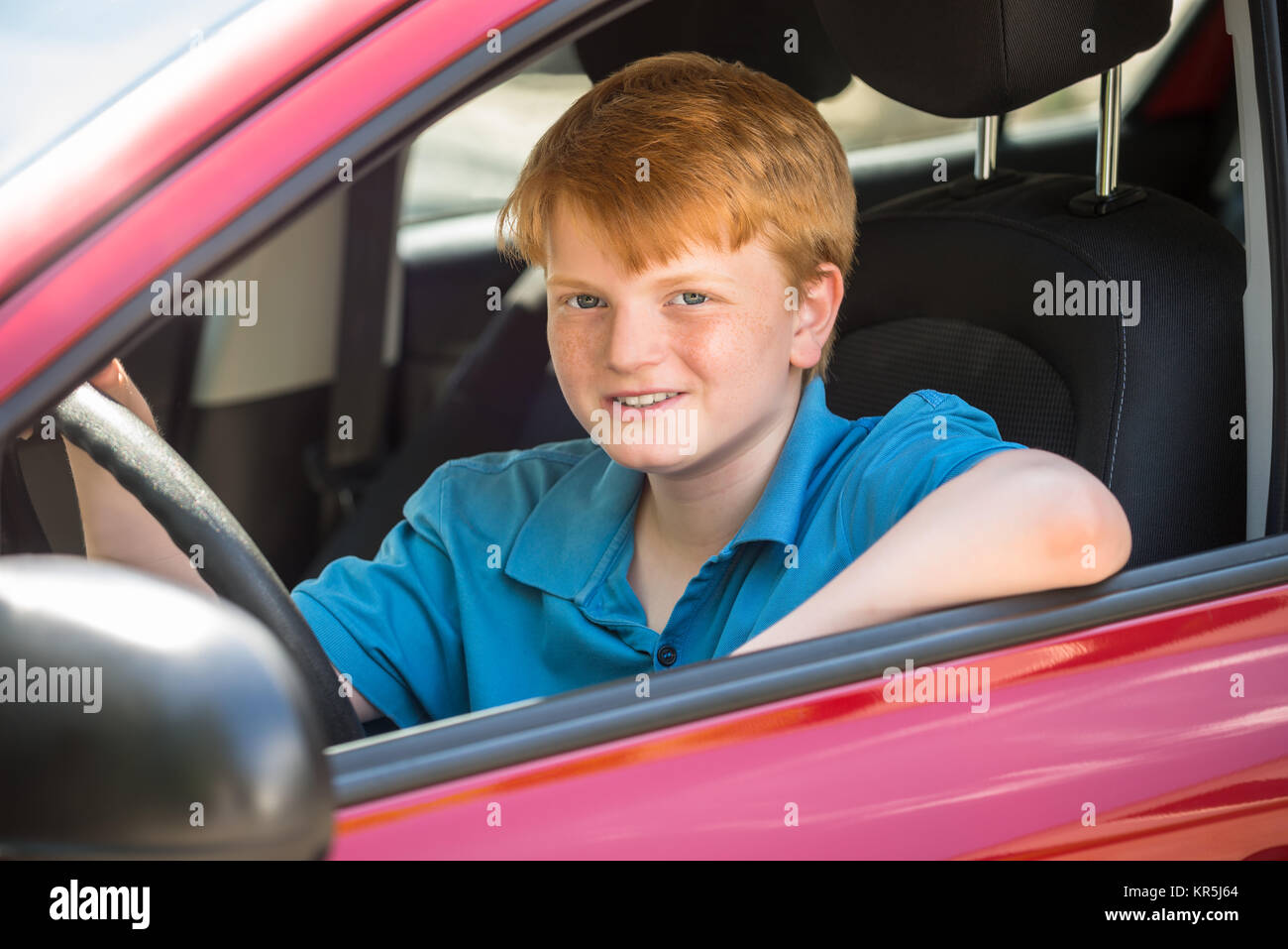 Boy peeking car hi-res stock photography and images - Alamy