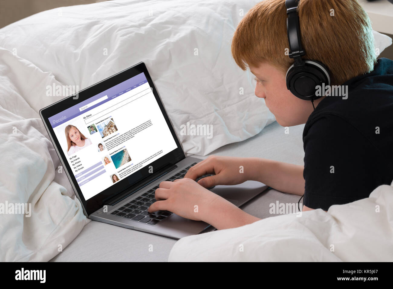 Boy Chatting On Social Networking Site Using Laptop Stock Photo - Alamy