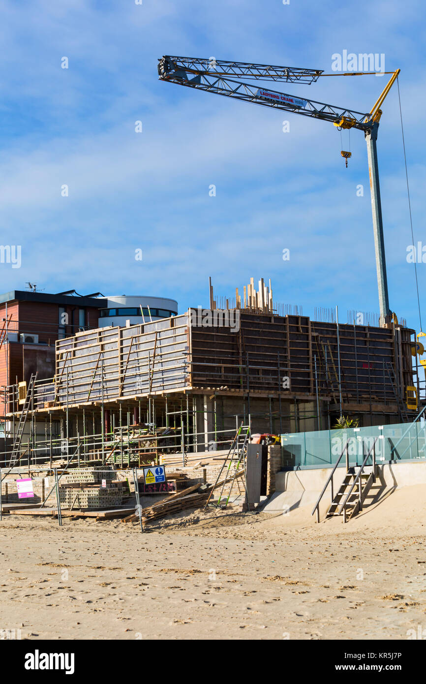 Redevelopment construction with luxury seaside properties at the beach ...
