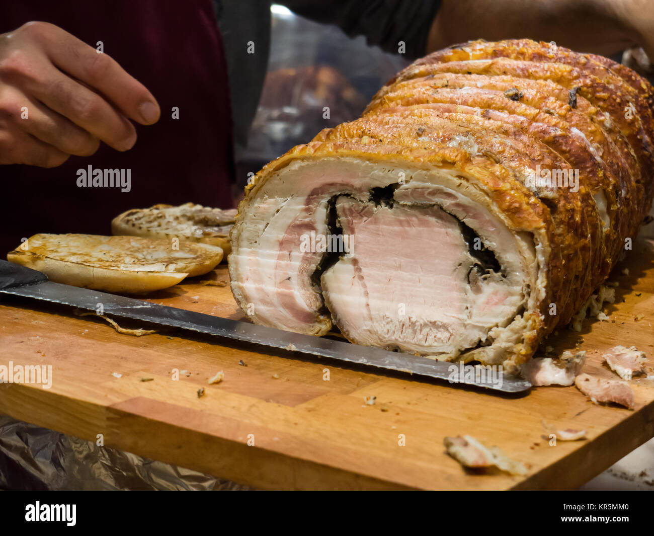 Italian street food, the sandwich with porchetta Stock Photo - Alamy