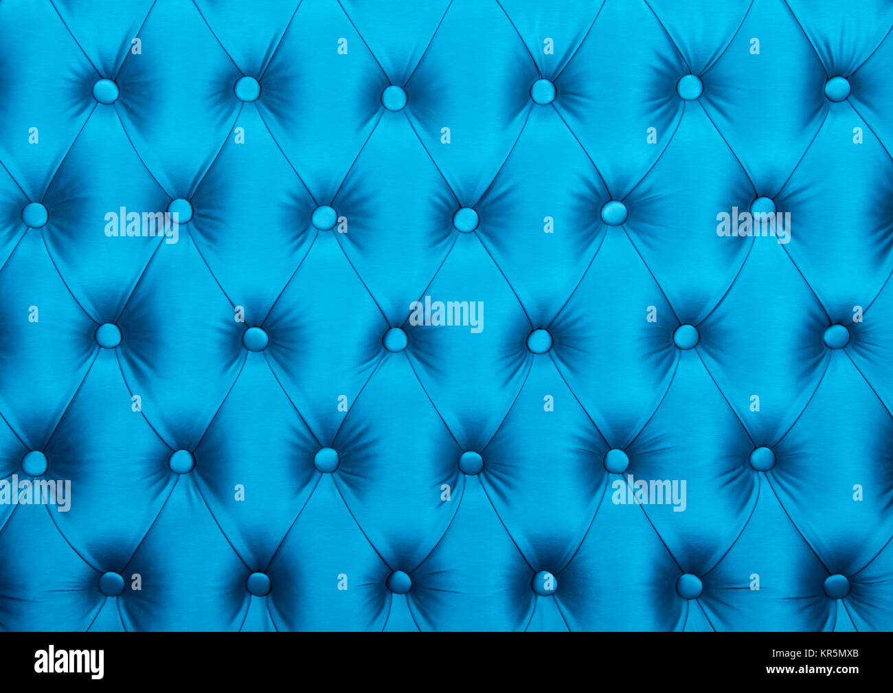 Blue capitone tufted fabric upholstery texture Stock Photo - Alamy