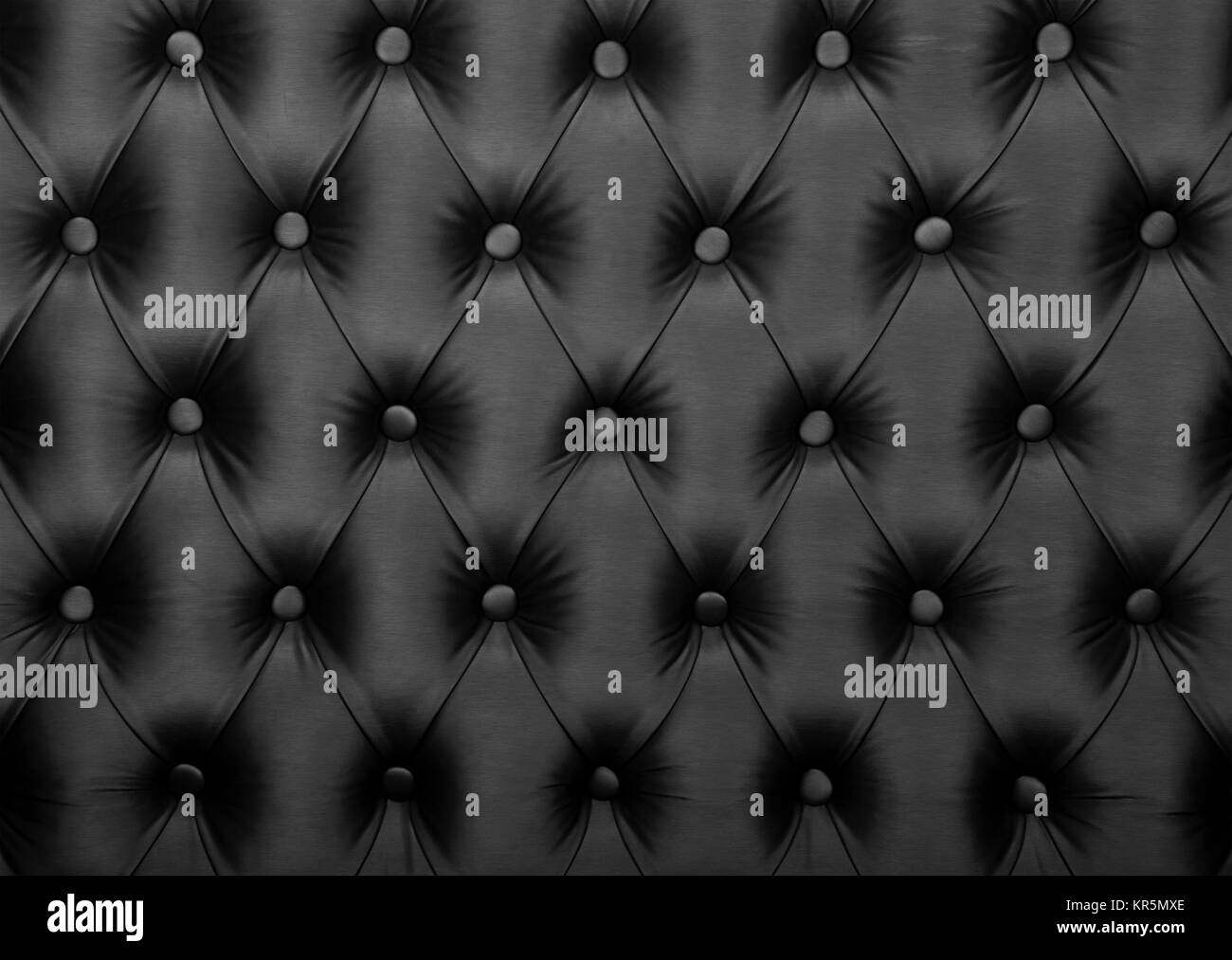 Black capitone tufted fabric upholstery texture Stock Photo - Alamy
