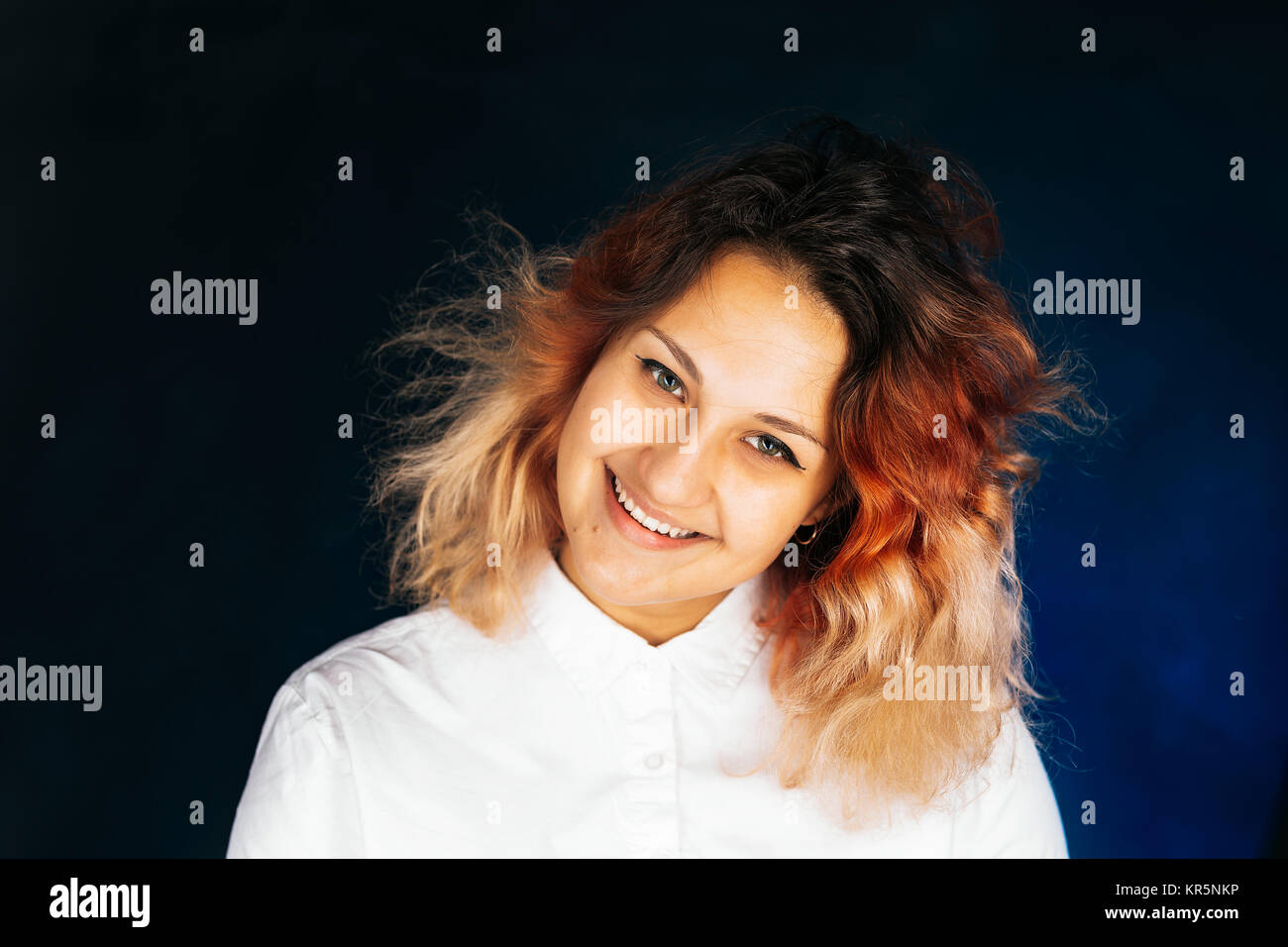 emotional young girl on a dark background Stock Photo - Alamy