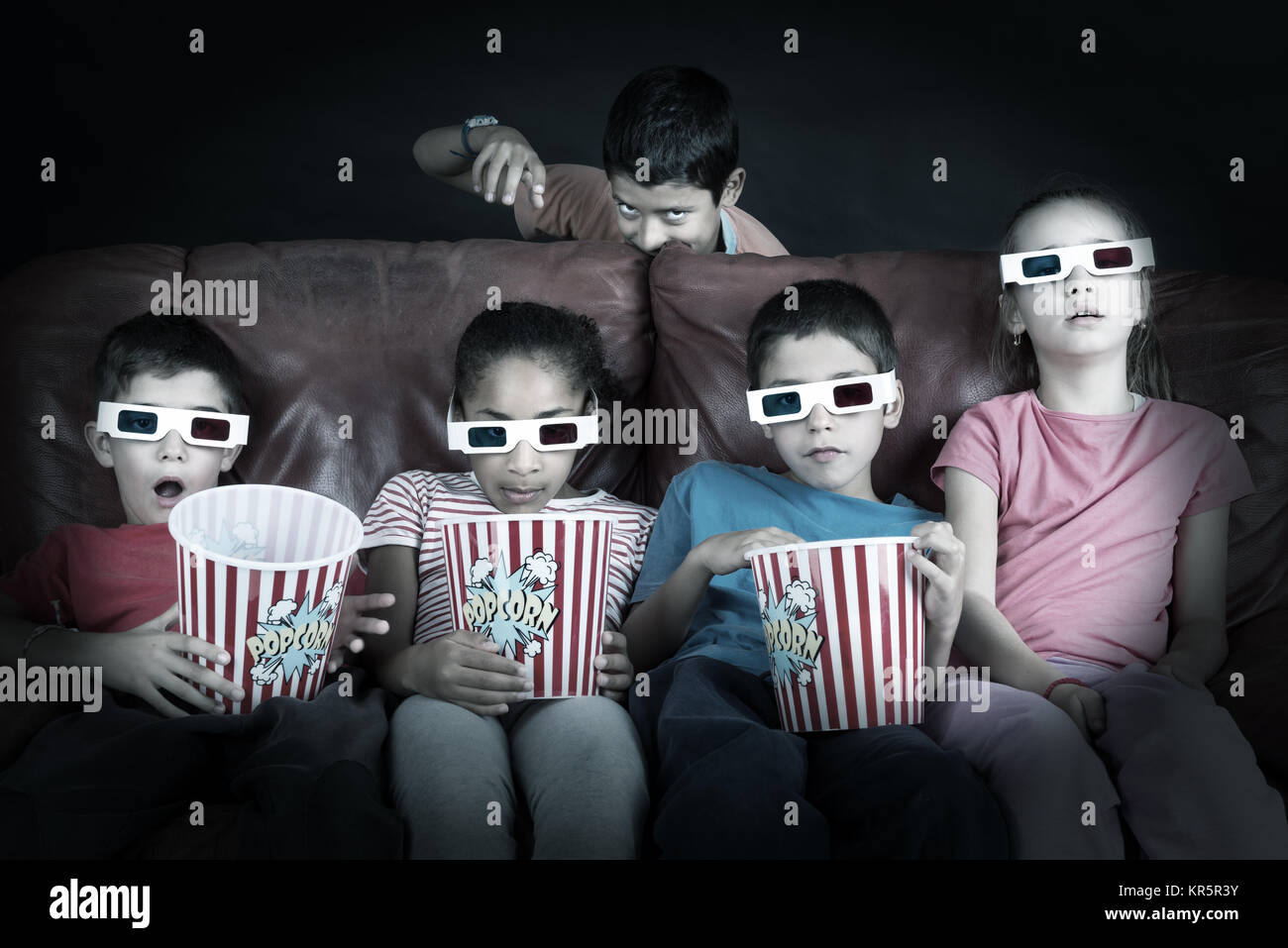 Kids in the movies Stock Photo - Alamy
