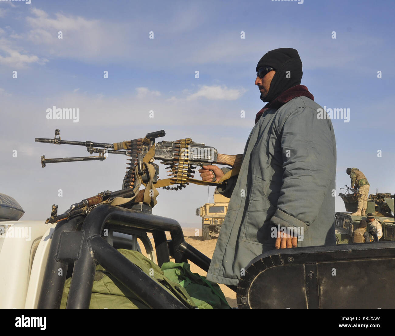 Sari Pul, Afghanistan. 18th Dec, 2017. An Afghan security force member ...