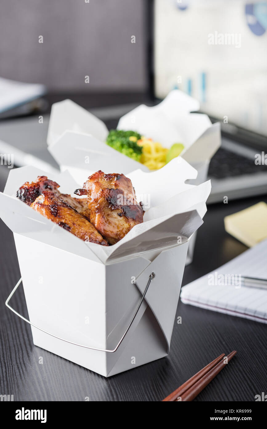 Office take away lunch with computer laptop Stock Photo - Alamy