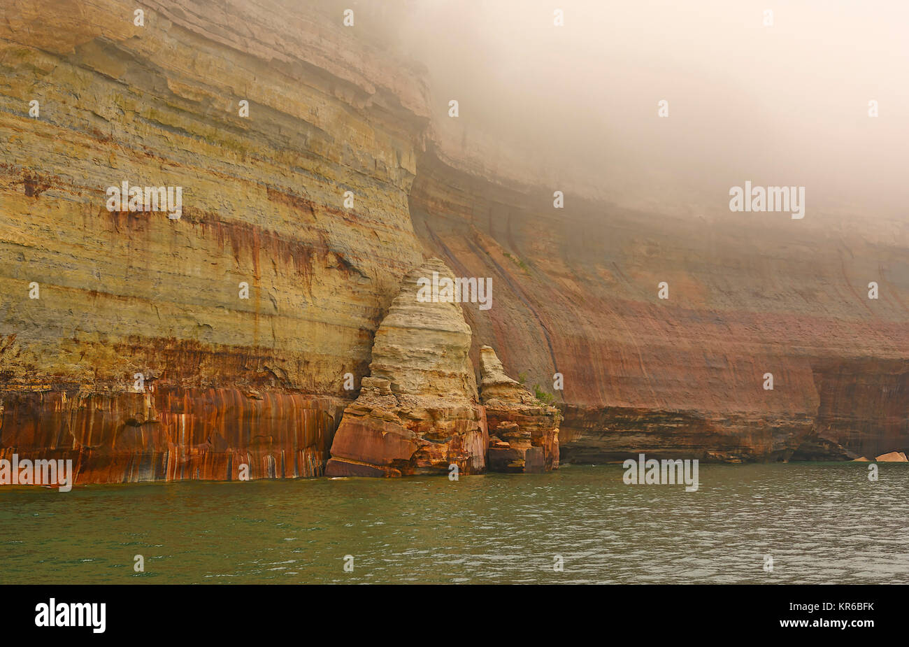 Colorful Cliffs in the Fog Stock Photo - Alamy