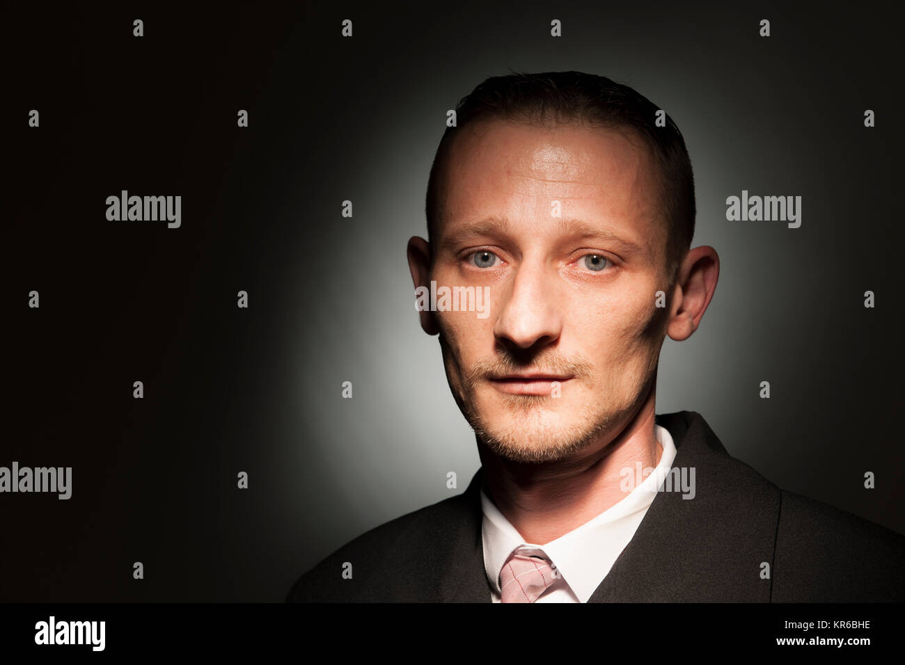 portrait of man with spotlight Stock Photo - Alamy