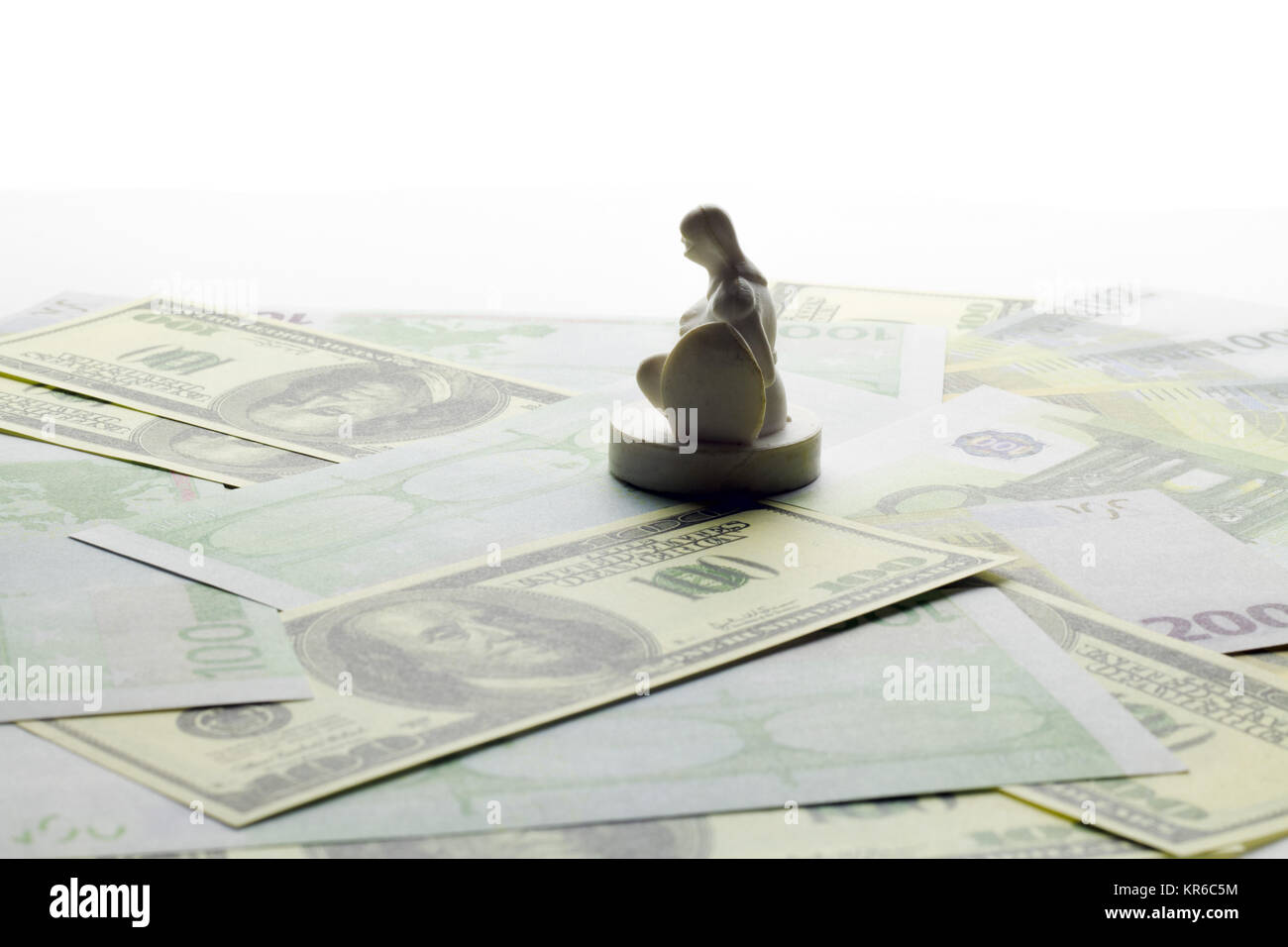 chess piece of a pawn in armor in the form of a figure of a man sitting ...