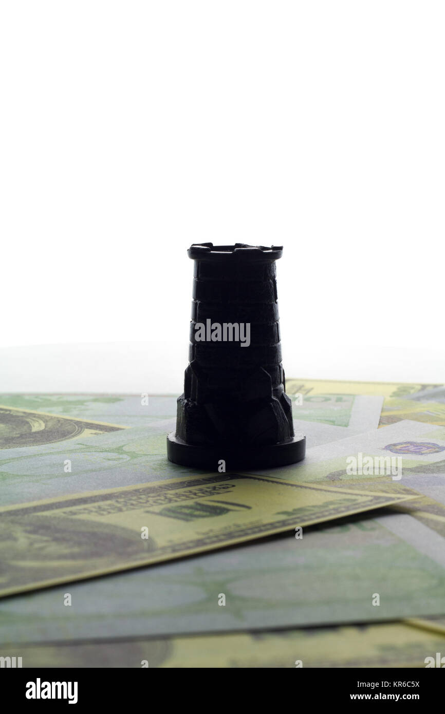 chess clack rock fortress tower on money banknote background. worship ...