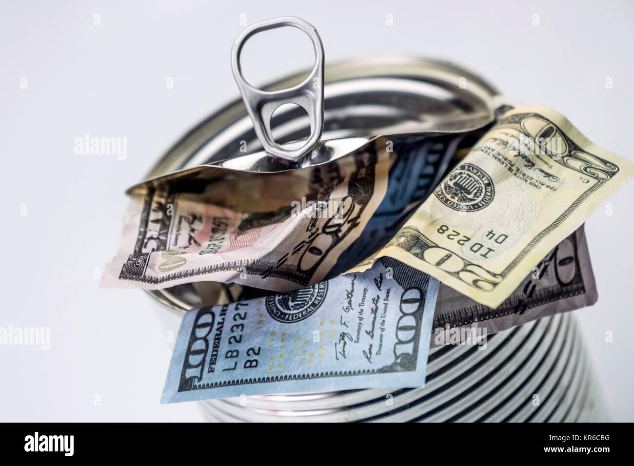 Money cans hi-res stock photography and images - Alamy