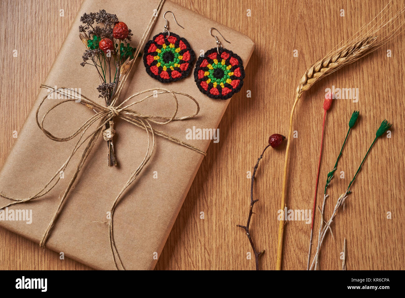 Book is wrapped in brown paper, tied with paper thread lying on the ...