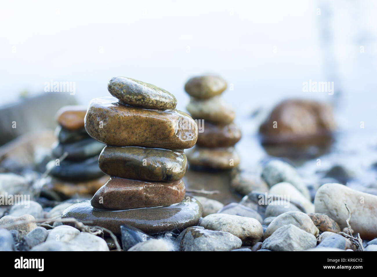 small pyramid of stones on the water Stock Photo - Alamy