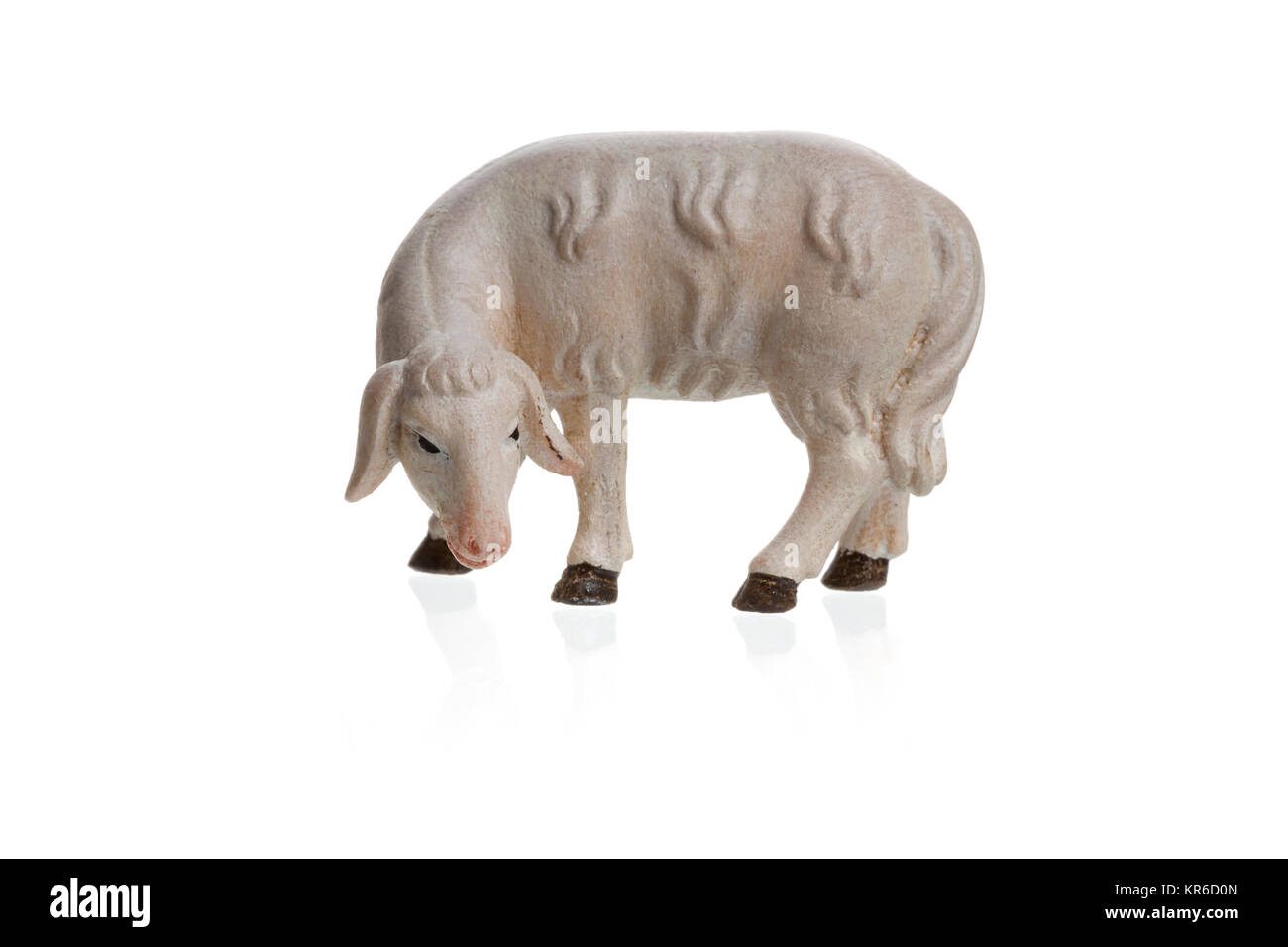 standing carved wooden nativity sheep on white background Stock Photo ...