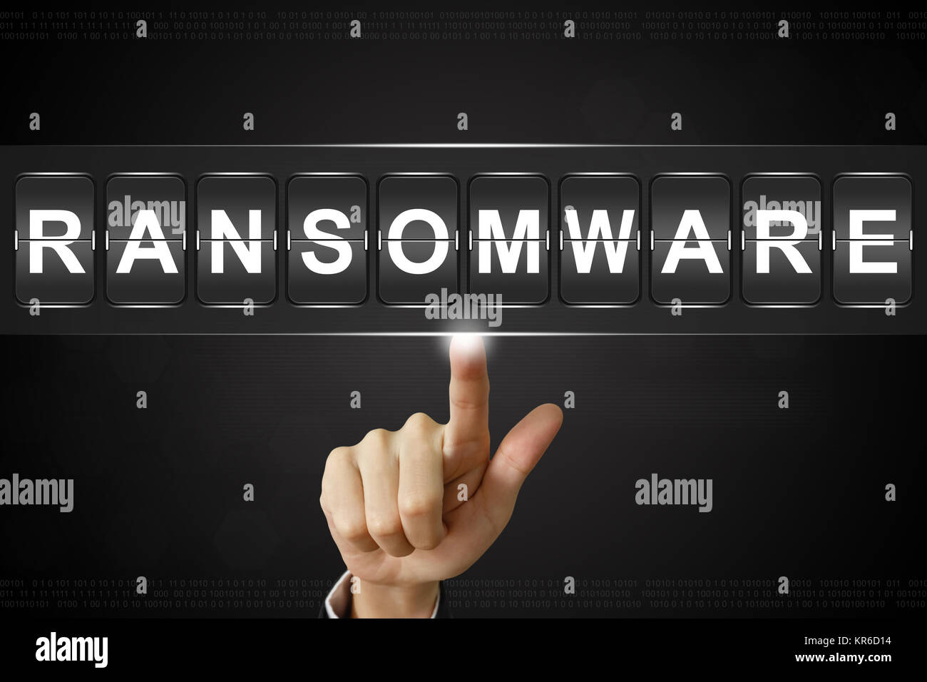 business hand clicking ransomware on Flipboard Stock Photo - Alamy