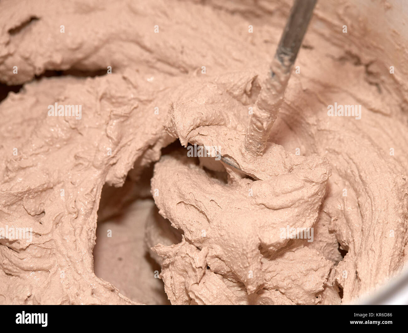 Mixing of a plaster solution by an electric drill Stock Photo - Alamy