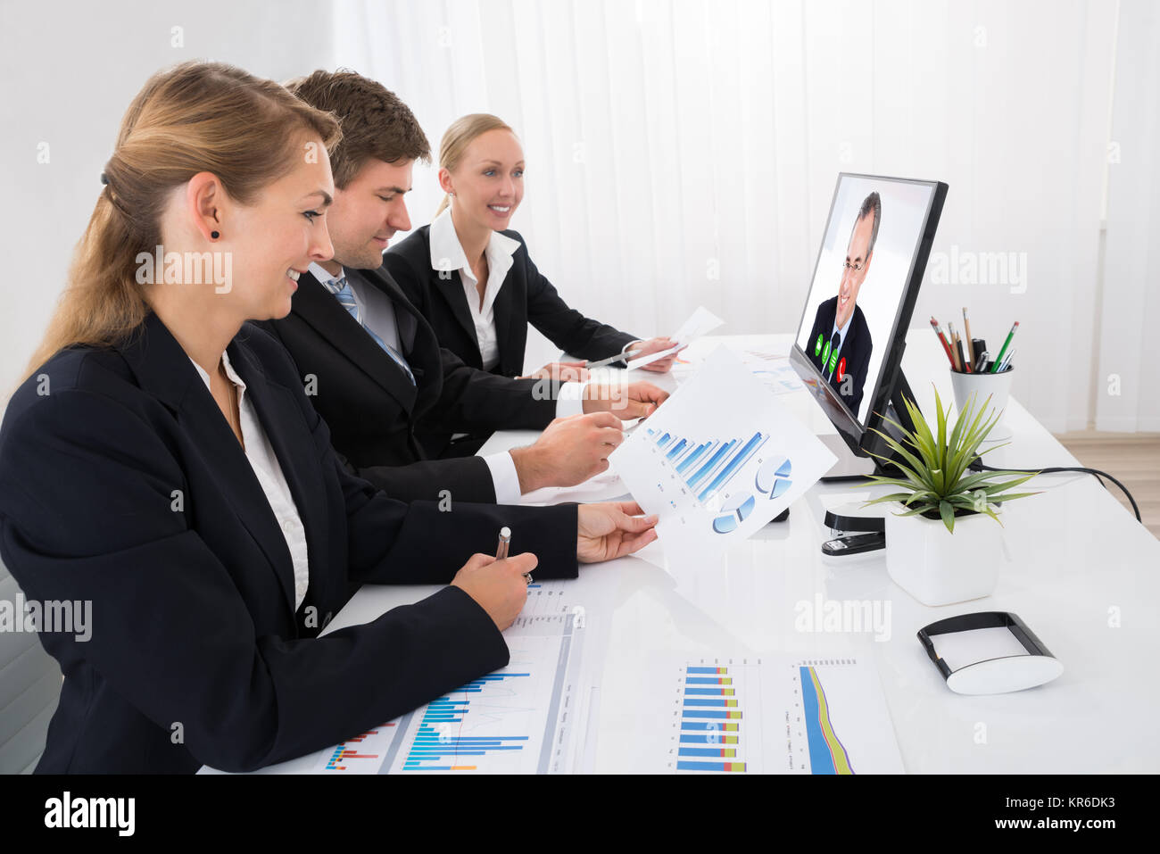 Businesspeople Video Conferencing On Computer Stock Photo - Alamy