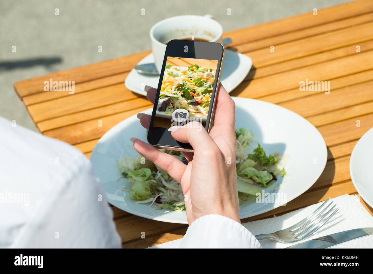 Person's Hand Taking Picture Of Food At Restaurant Stock Photo - Alamy
