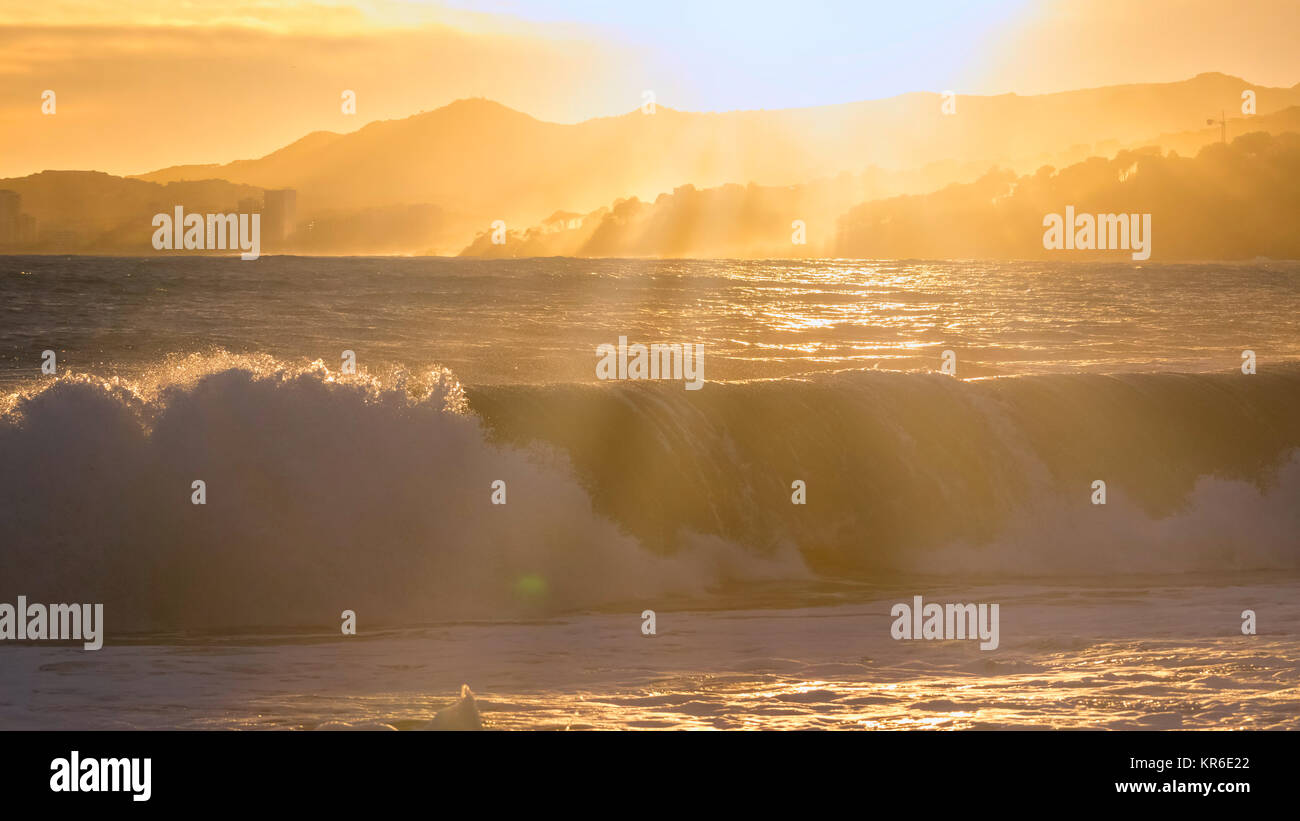 Beautiful sunset in Spain with big waves, Costa Brava Stock Photo - Alamy