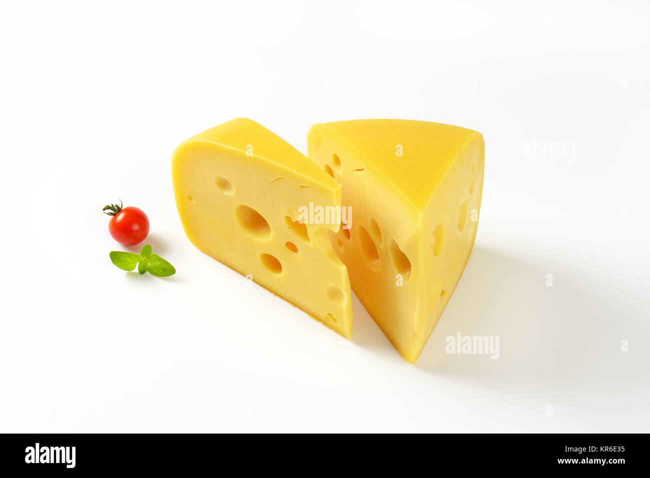 wedges of yellow cheese with eyes Stock Photo - Alamy