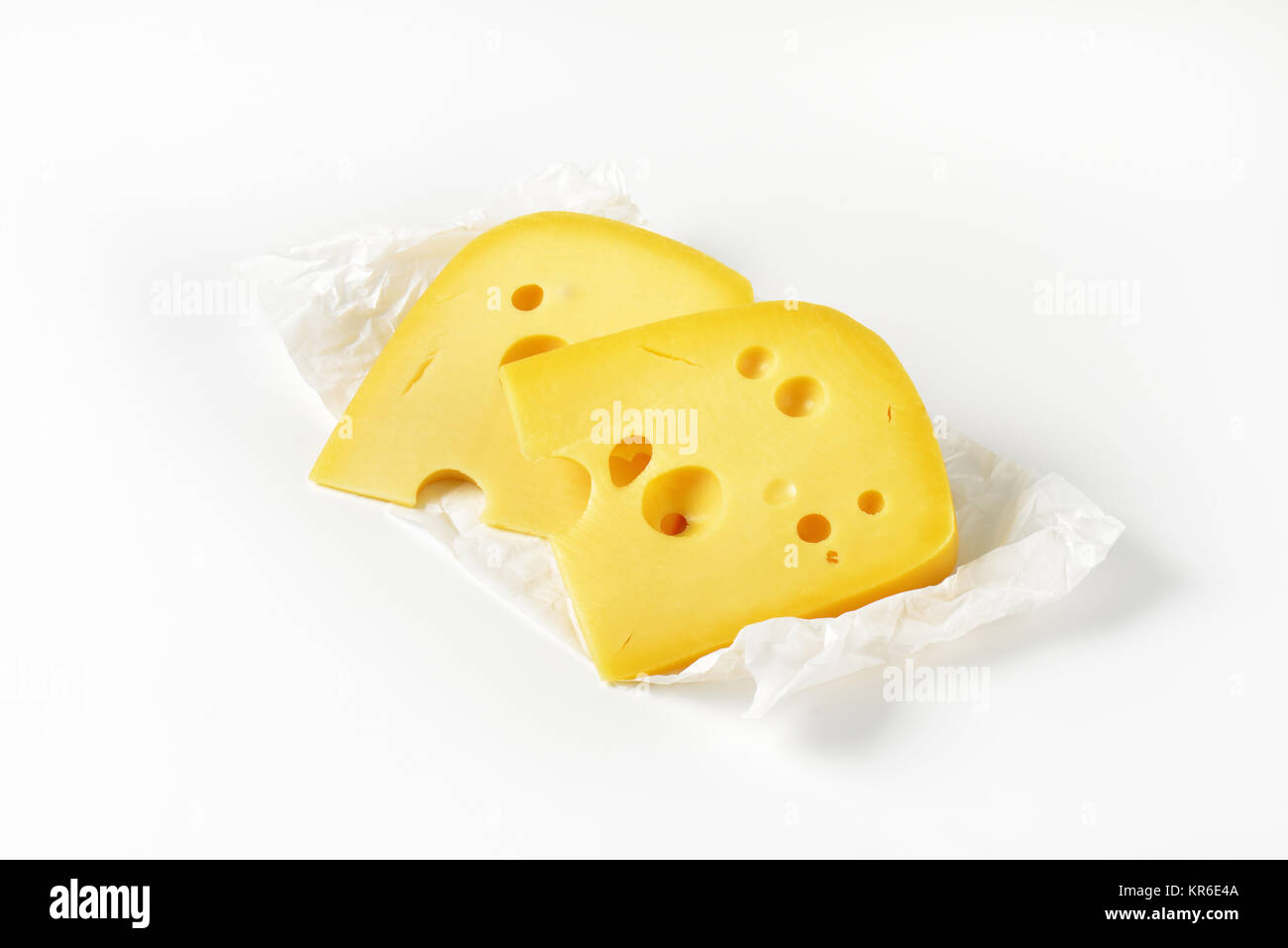 wedges of yellow cheese with eyes Stock Photo - Alamy