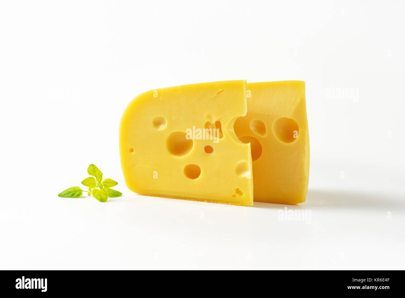 wedges of yellow cheese with eyes Stock Photo - Alamy