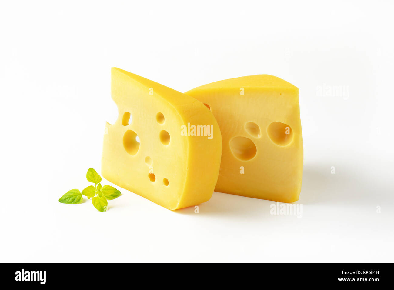 wedges of yellow cheese with eyes Stock Photo - Alamy