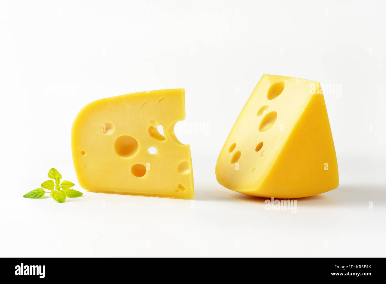 wedges of yellow cheese with eyes Stock Photo - Alamy