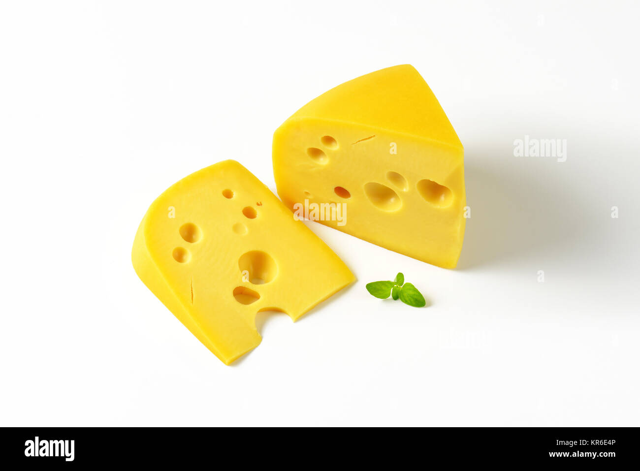 wedges of yellow cheese with eyes Stock Photo - Alamy