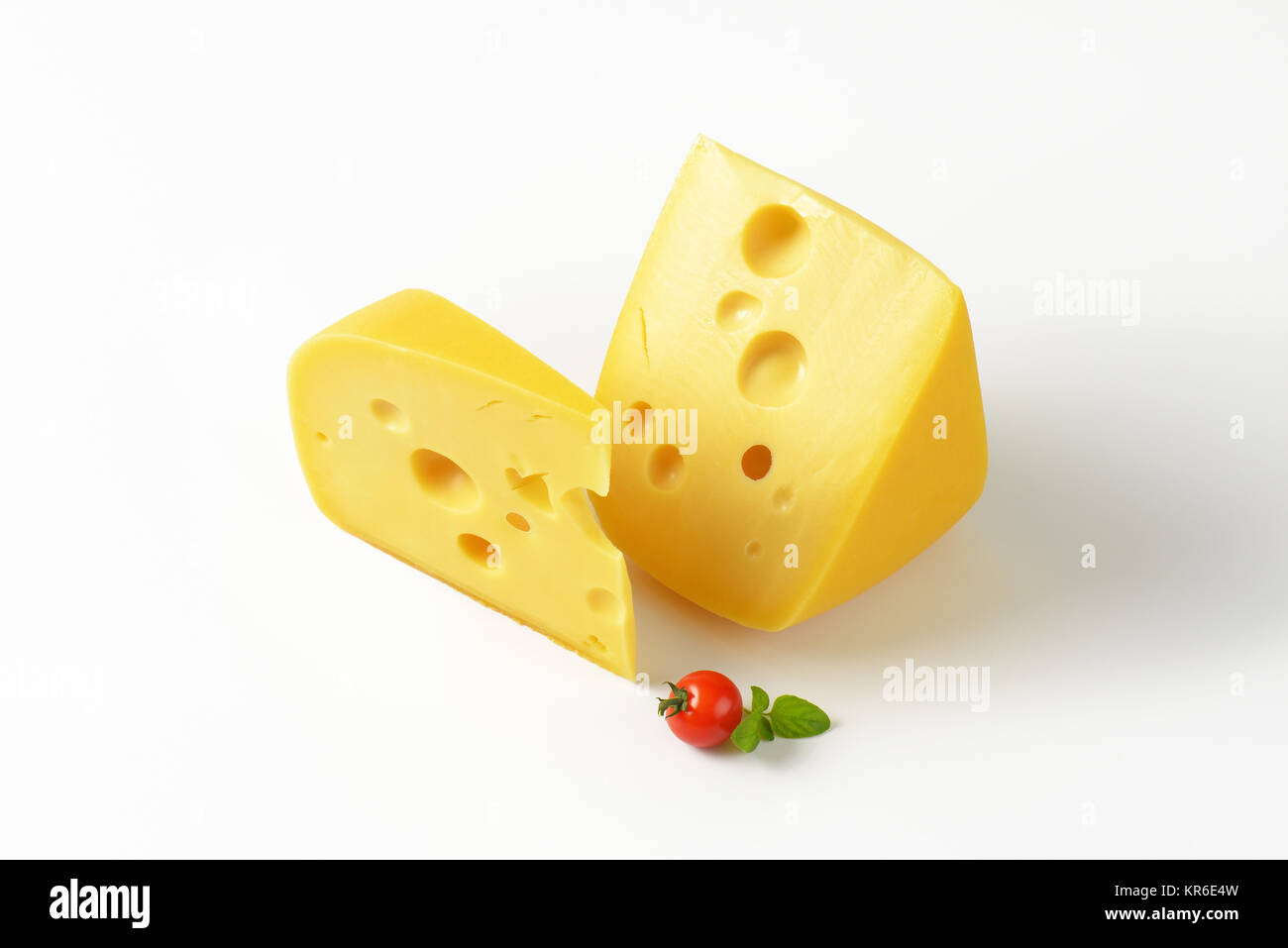 wedges of yellow cheese with eyes Stock Photo - Alamy