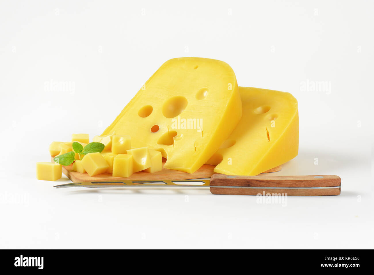 Swiss cheese wedges hi-res stock photography and images - Alamy