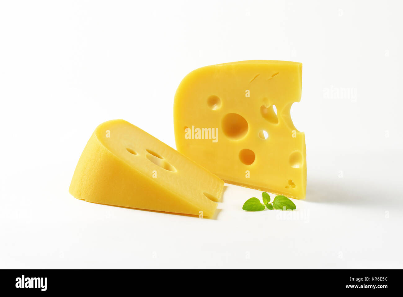 wedges of yellow cheese with eyes Stock Photo - Alamy