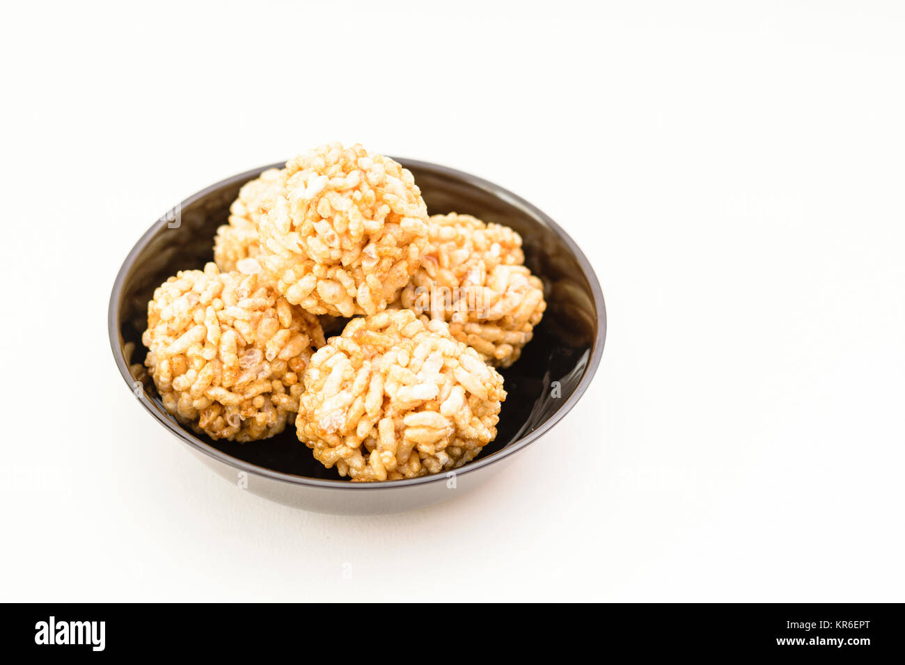 Pori Urundai or Murmura balls (Sweet Puffed Rice balls Stock Photo - Alamy