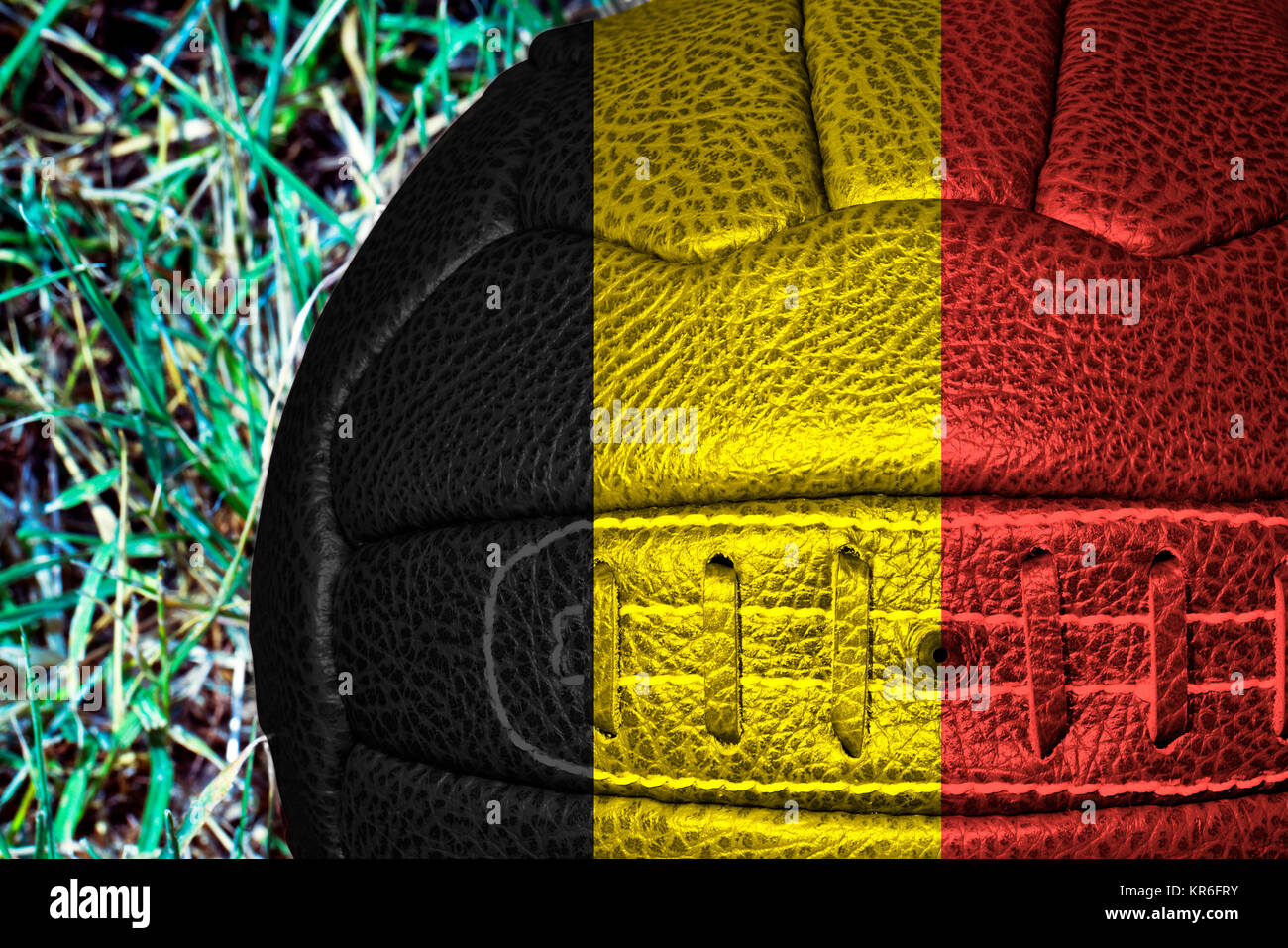 Vintage football over grass field Stock Photo - Alamy