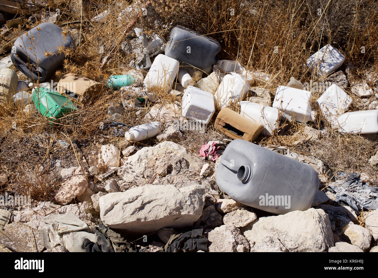 Dumped plastic containers and other waste in the countryside Stock ...