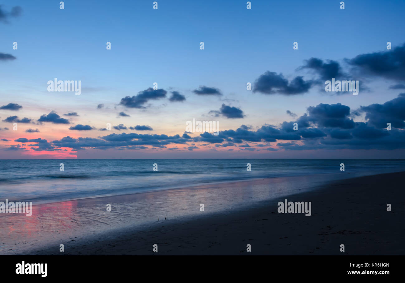 Beach sunset with beautiful skyline afterglow Stock Photo - Alamy