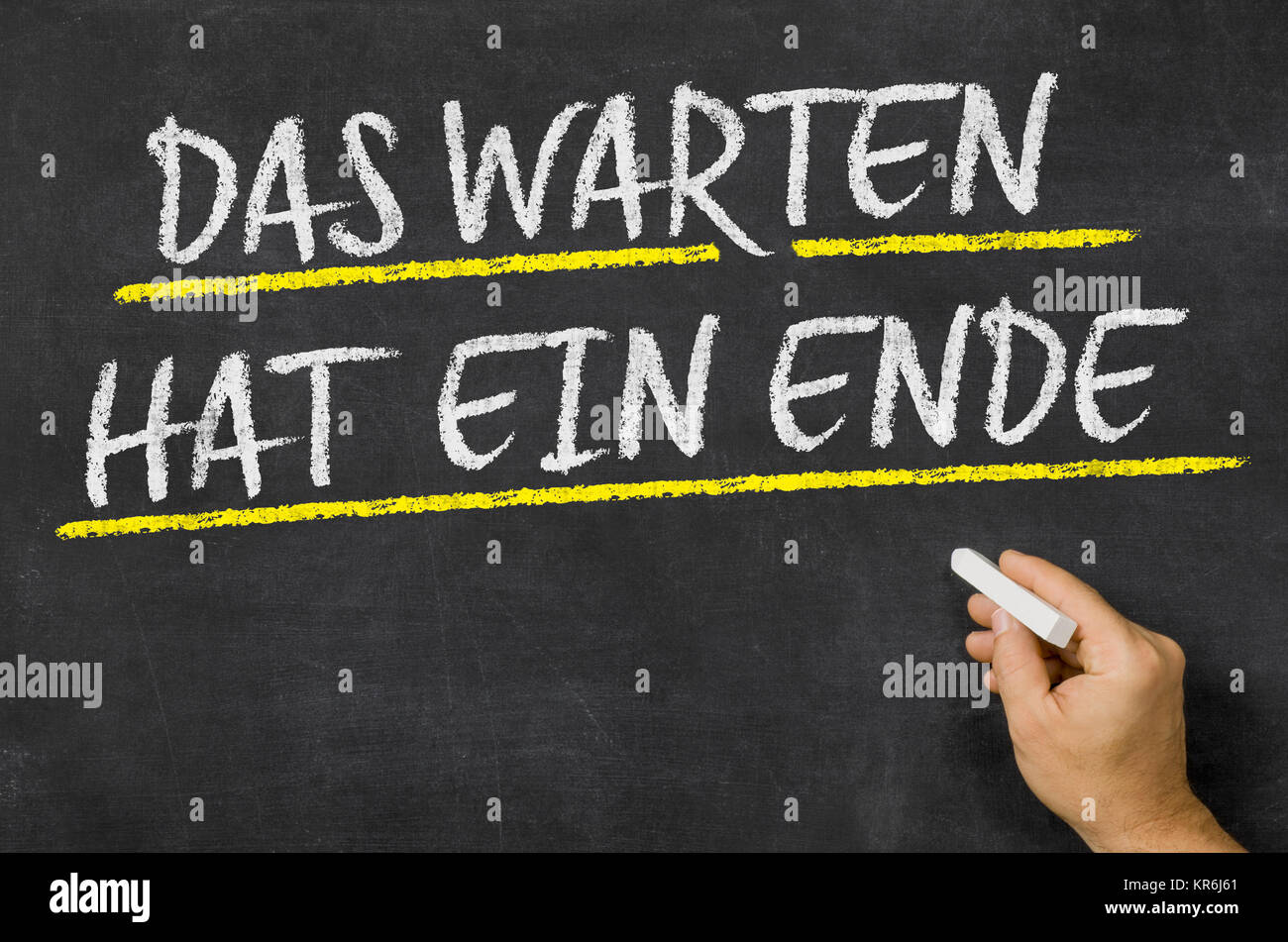 text on blackboard - the wait is over Stock Photo - Alamy