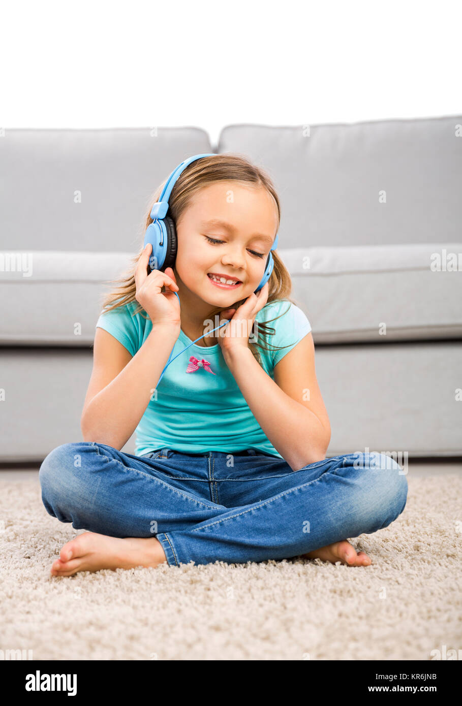 Cute girl listen music Stock Photo - Alamy