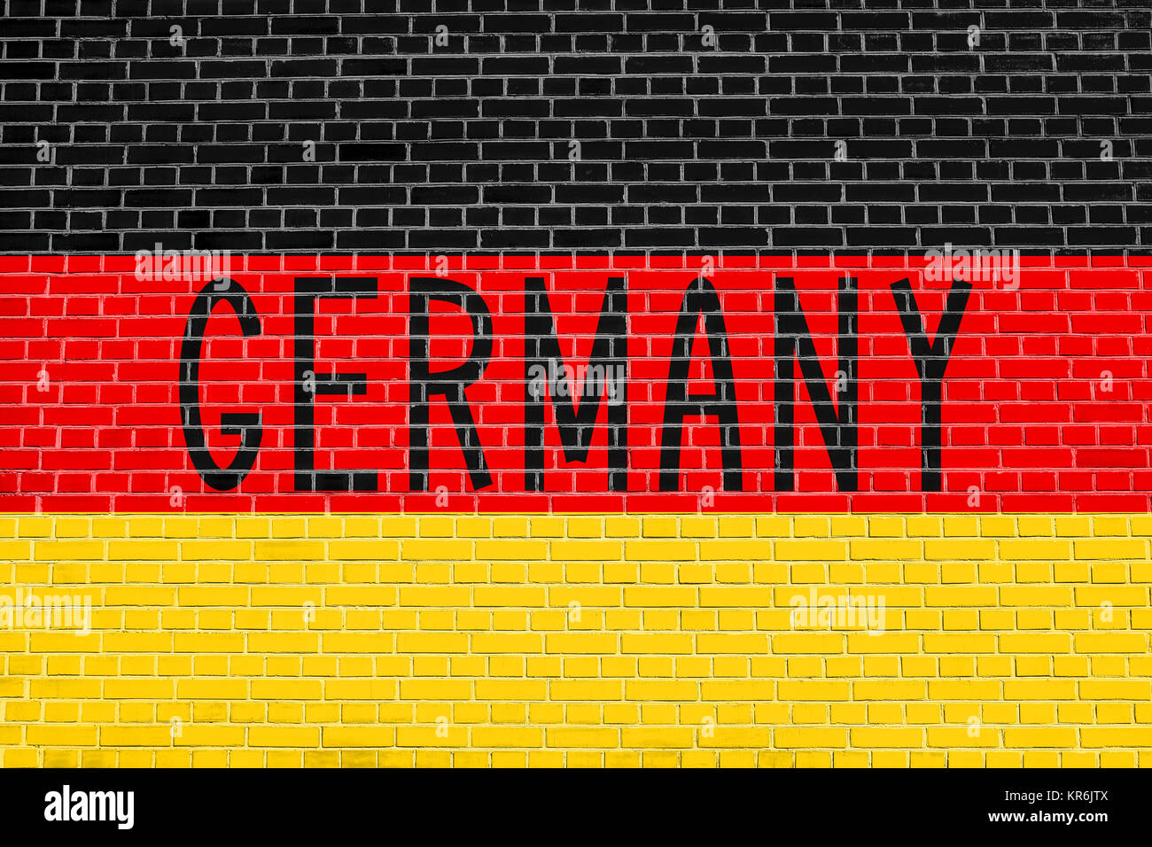 German flag and word Germany on brick wall Stock Photo - Alamy