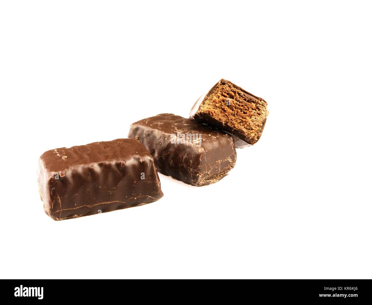 Bitten chocolate Candy flavored chocolate truffles On a white Stock ...