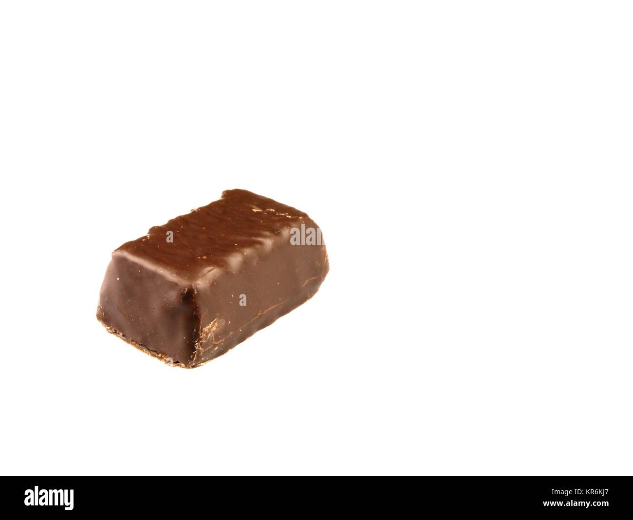 Bitten chocolate Candy flavored chocolate truffles On a white Stock ...