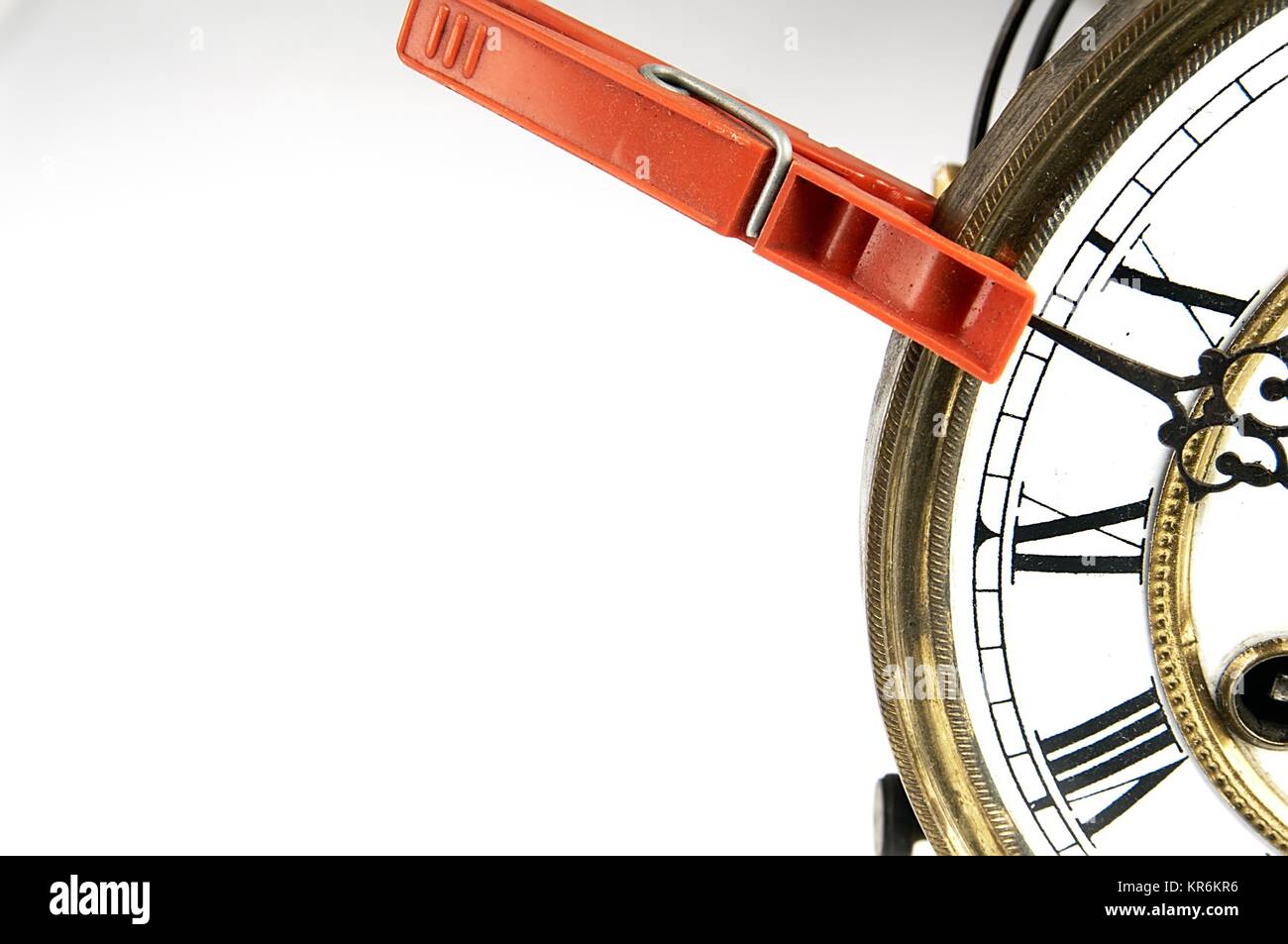 Clothespin stop the clock Stock Photo - Alamy