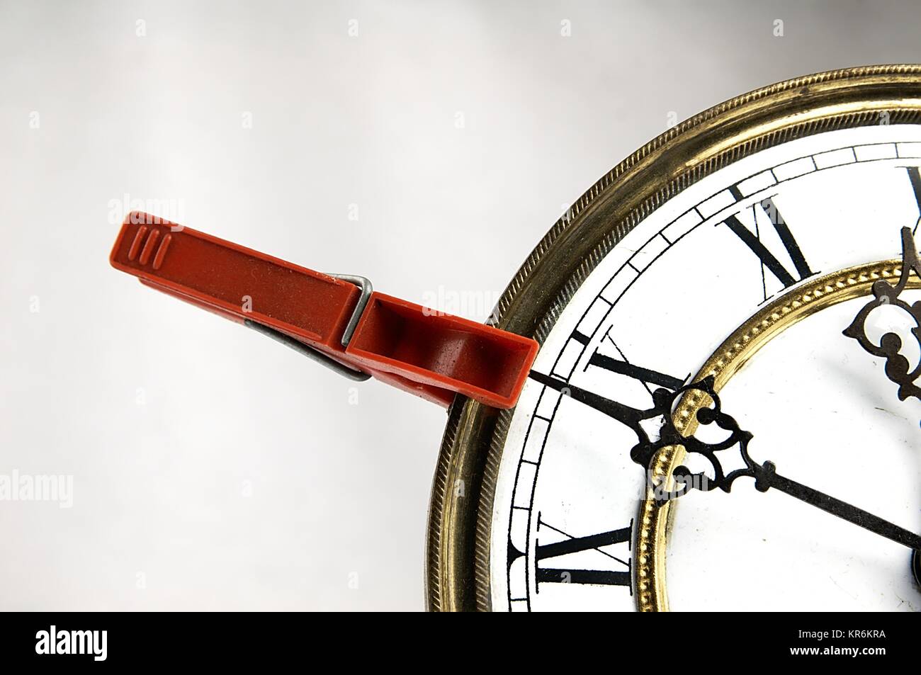 Clothespin stop the clock Stock Photo - Alamy