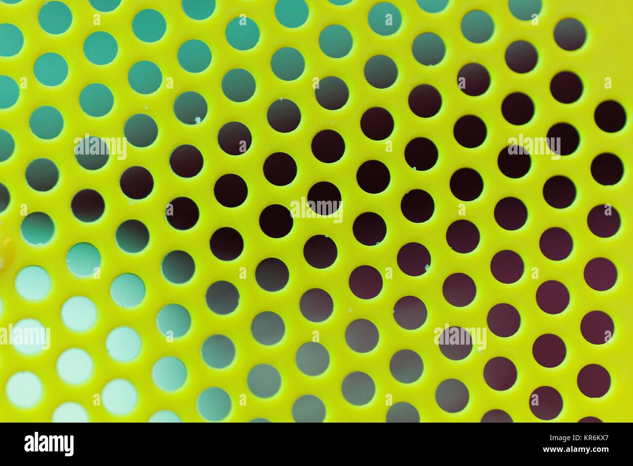 Colored surface with holes Stock Photo - Alamy