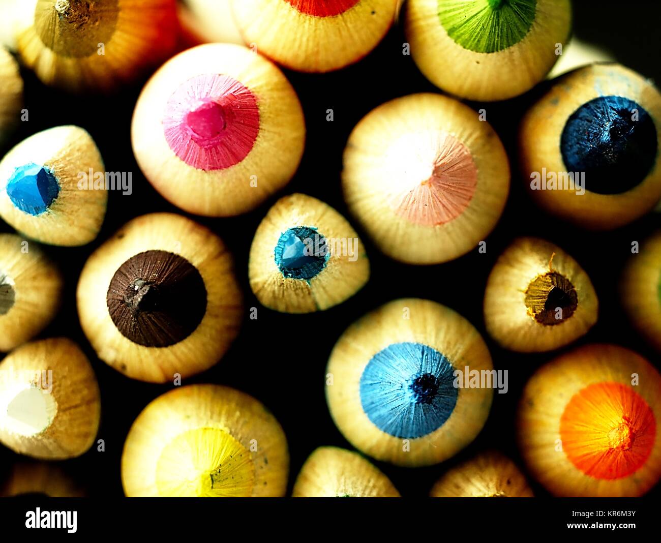 Colorful wooden crayons closely Stock Photo - Alamy